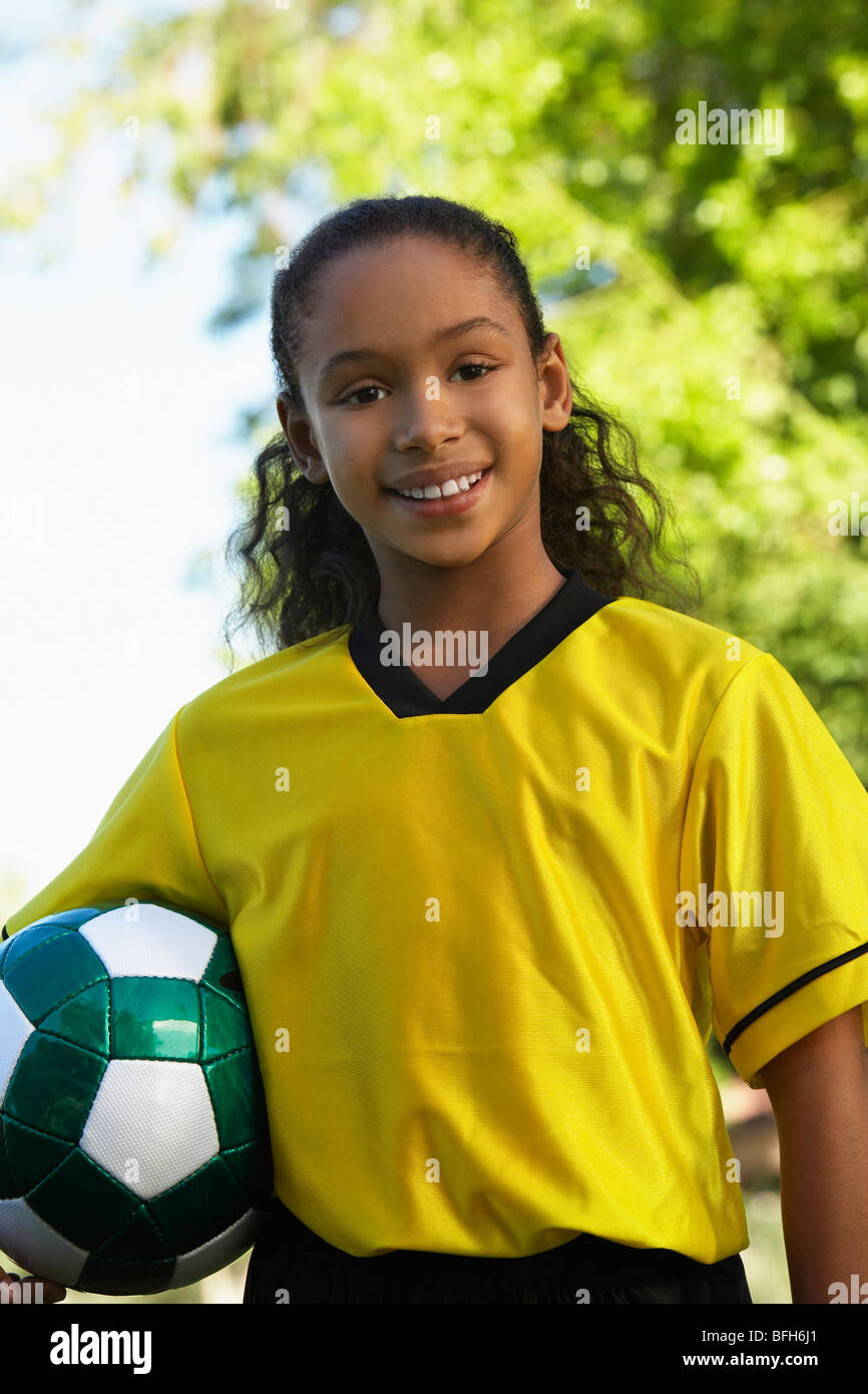 Soccer ball under arm hi-res stock photography and images - Alamy