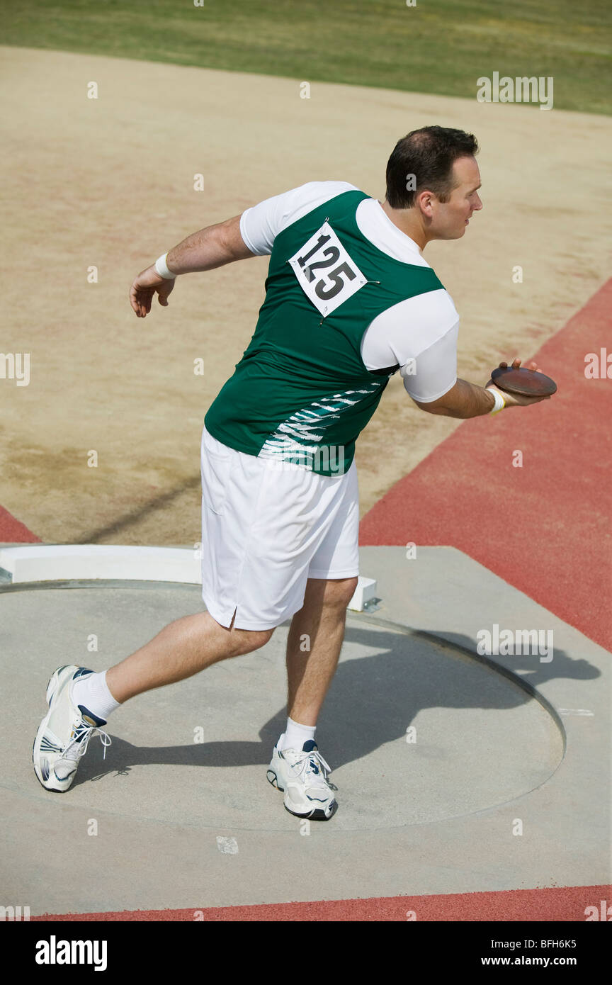 Male athlete training in circle Stock Photo - Alamy