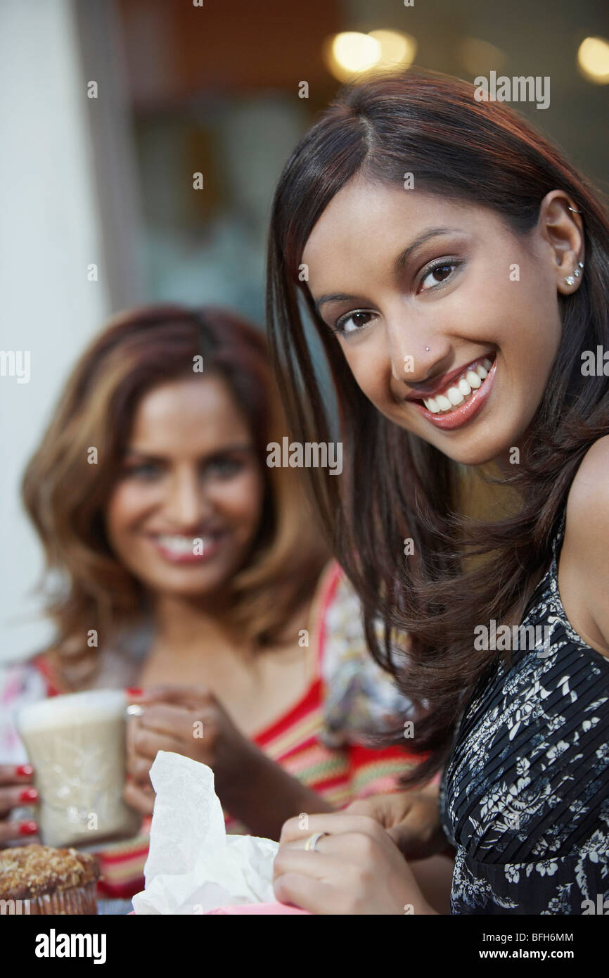 Portrait of two women at cafe table Stock Photo - Alamy
