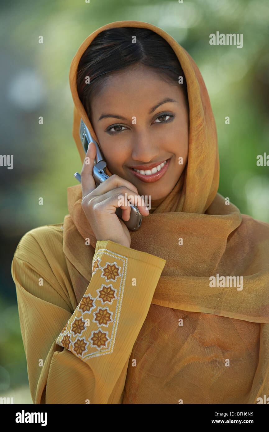 Portrait of muslim woman talking on mobile Stock Photo - Alamy