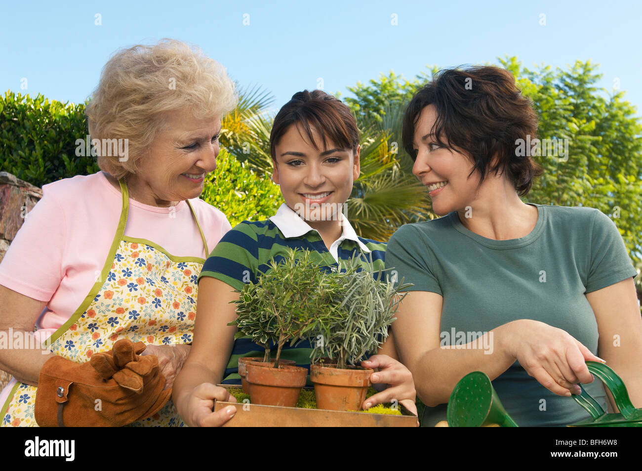 Portrait of three women gardening Stock Photo - Alamy