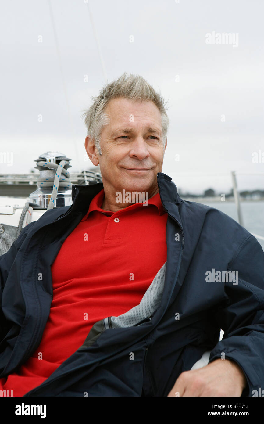 Man relaxing on yacht, portrait Stock Photo - Alamy