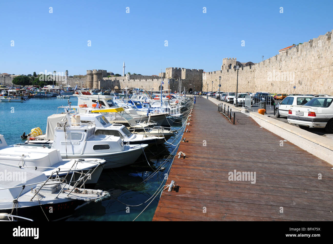 Mandraki harbor in Rhodes City, Rhodes Stock Photo - Alamy