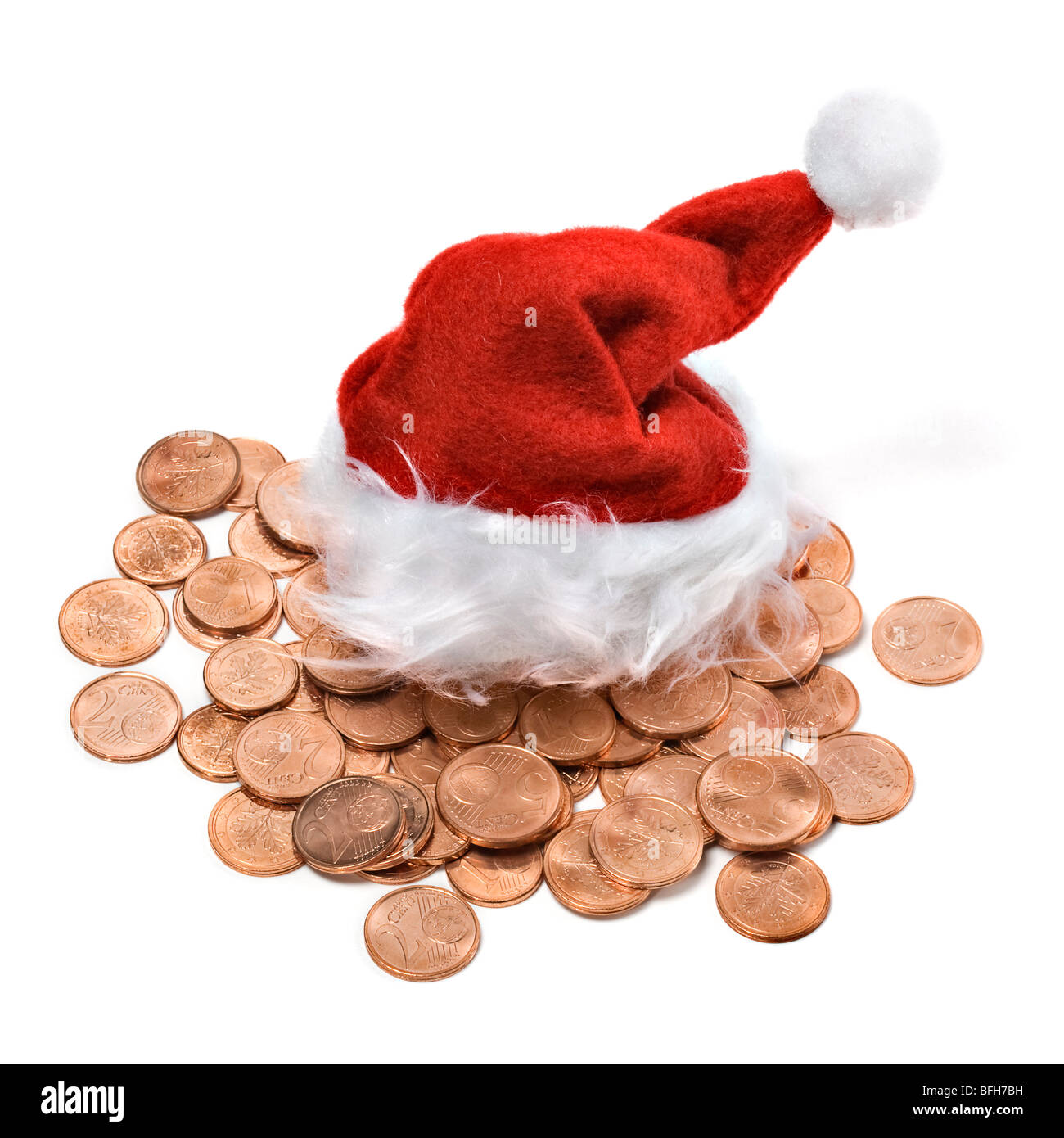 Santa hat and small coins on white Stock Photo - Alamy