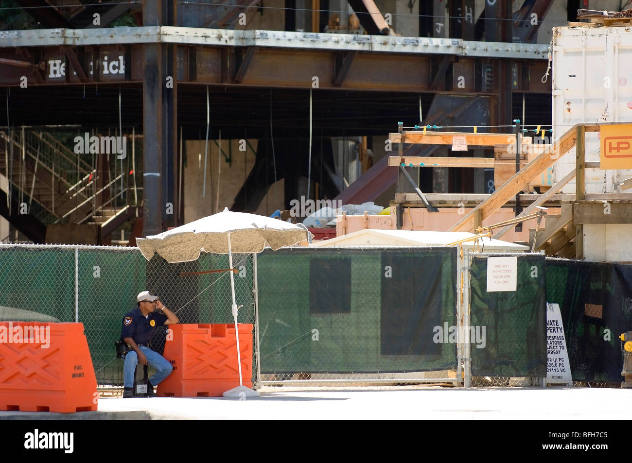 Security guard at a construction site Stock Photo - Alamy