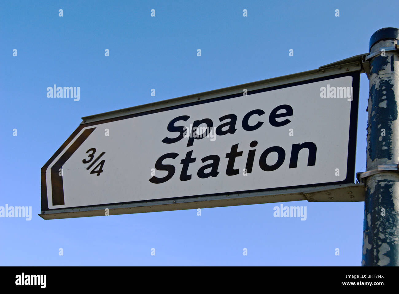 left pointing sign for space station, a storage company, on the great ...