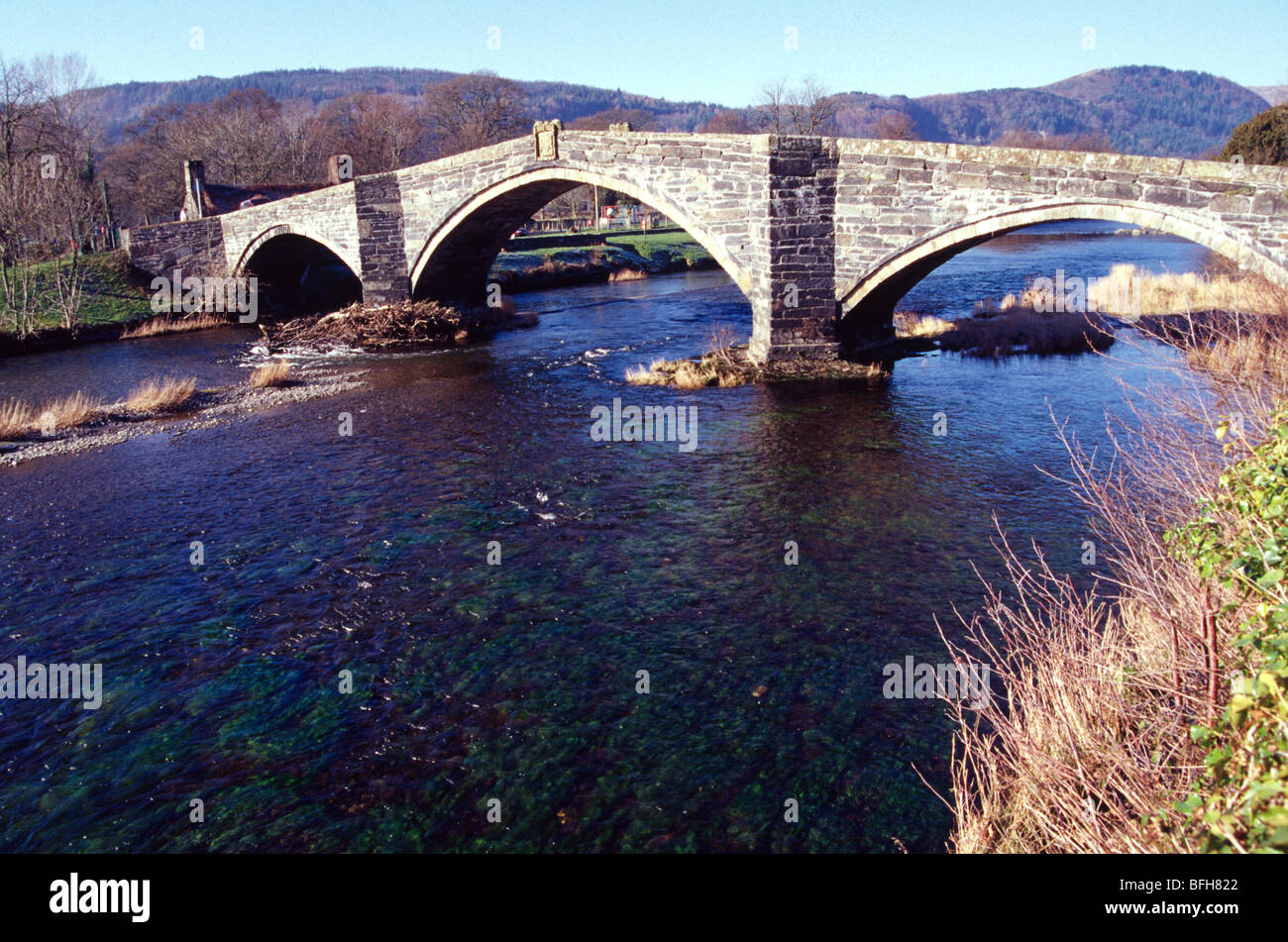 stone arch bridge river conwy llanrwst snowdonia wales Stock Photo - Alamy