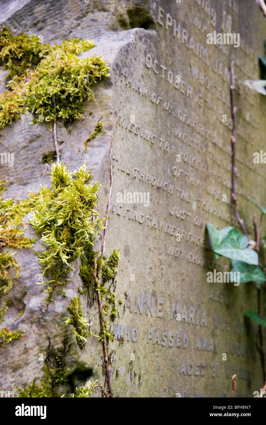 Carving on mossy gravestone at Highgate cemetery in London England UK ...