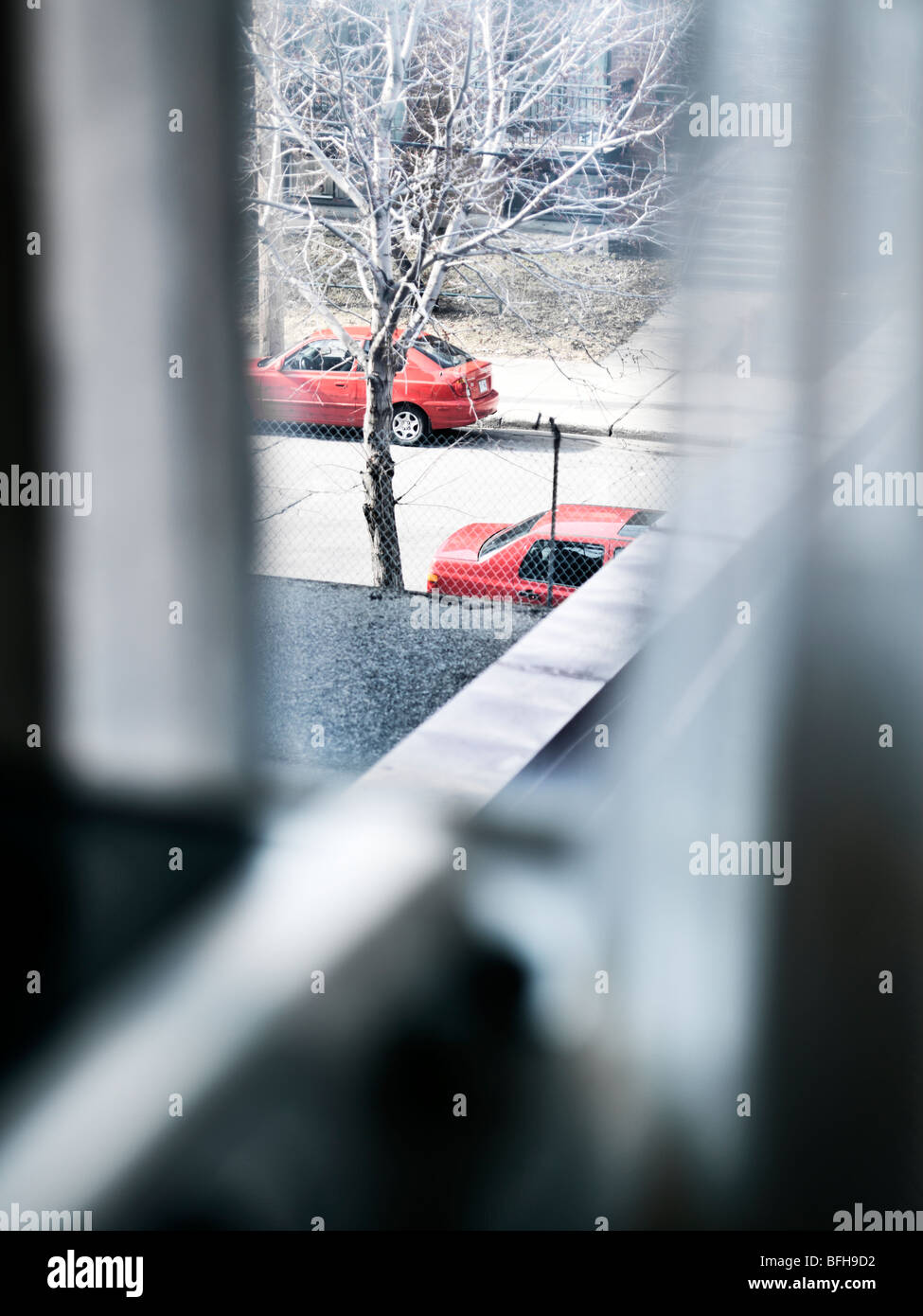 two red cars viewed above from a curtained window Stock Photo - Alamy