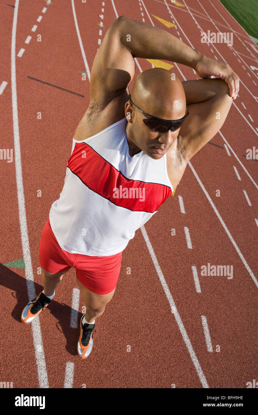 Athletic man warming up back hi-res stock photography and images - Alamy