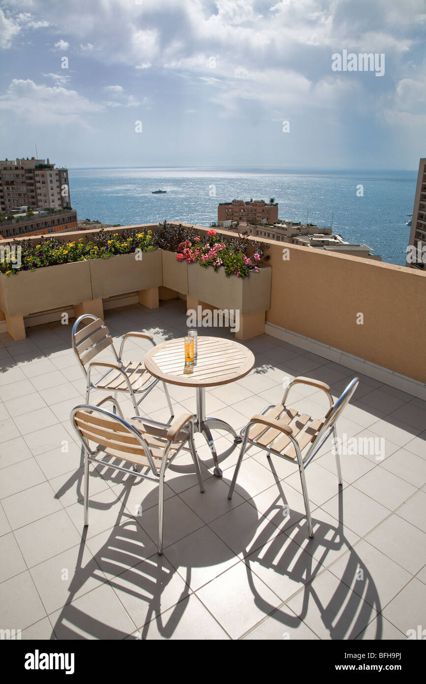 Table chairs on rooftop hi-res stock photography and images - Alamy