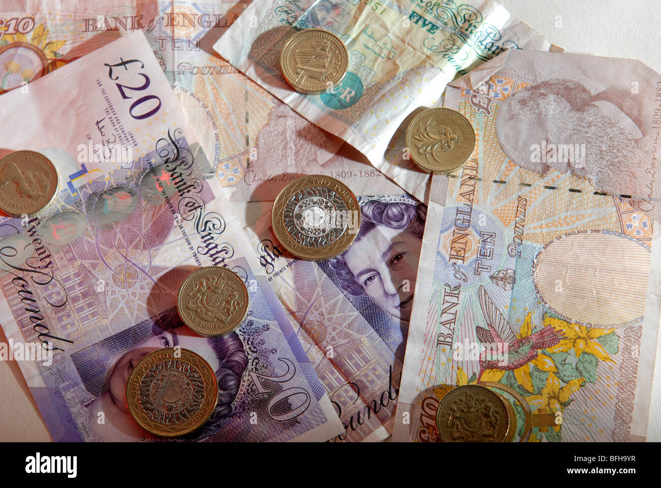 generic money image showing British coin and notes £ pound sterling ...