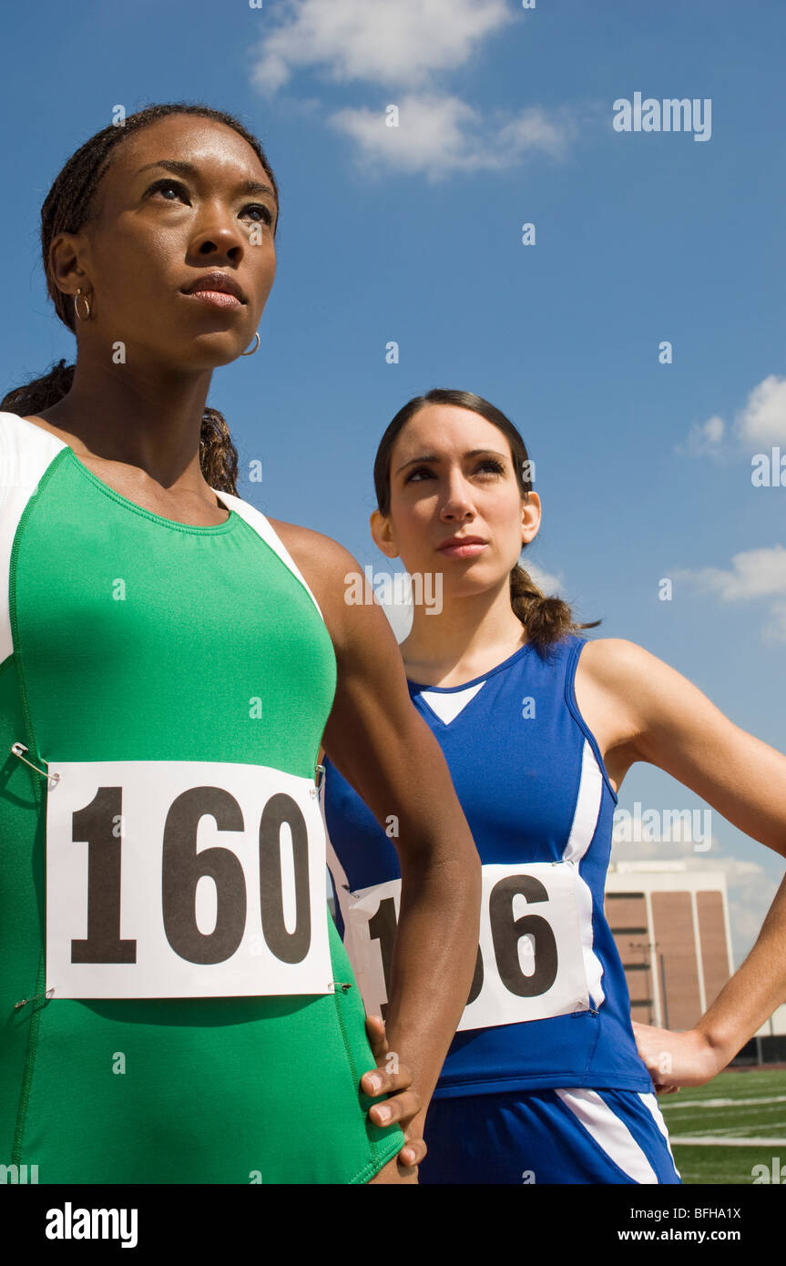 Two female track athletes Stock Photo - Alamy