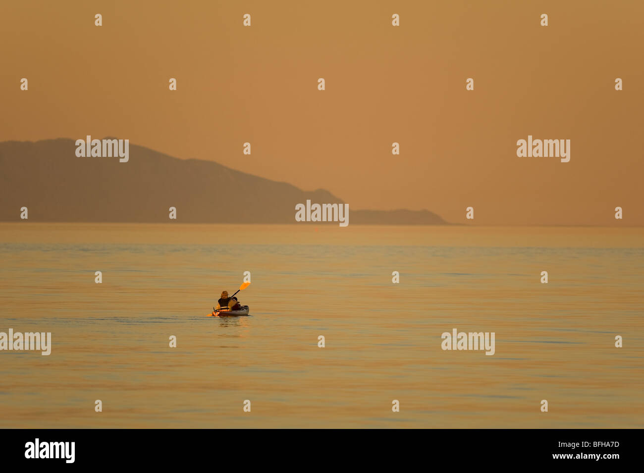 A mother and child at twilight, Goose Spit Regional Park. Comox, The ...