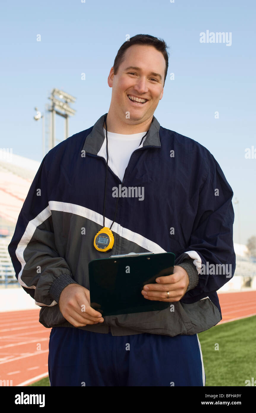Sports coach on stadium Stock Photo - Alamy