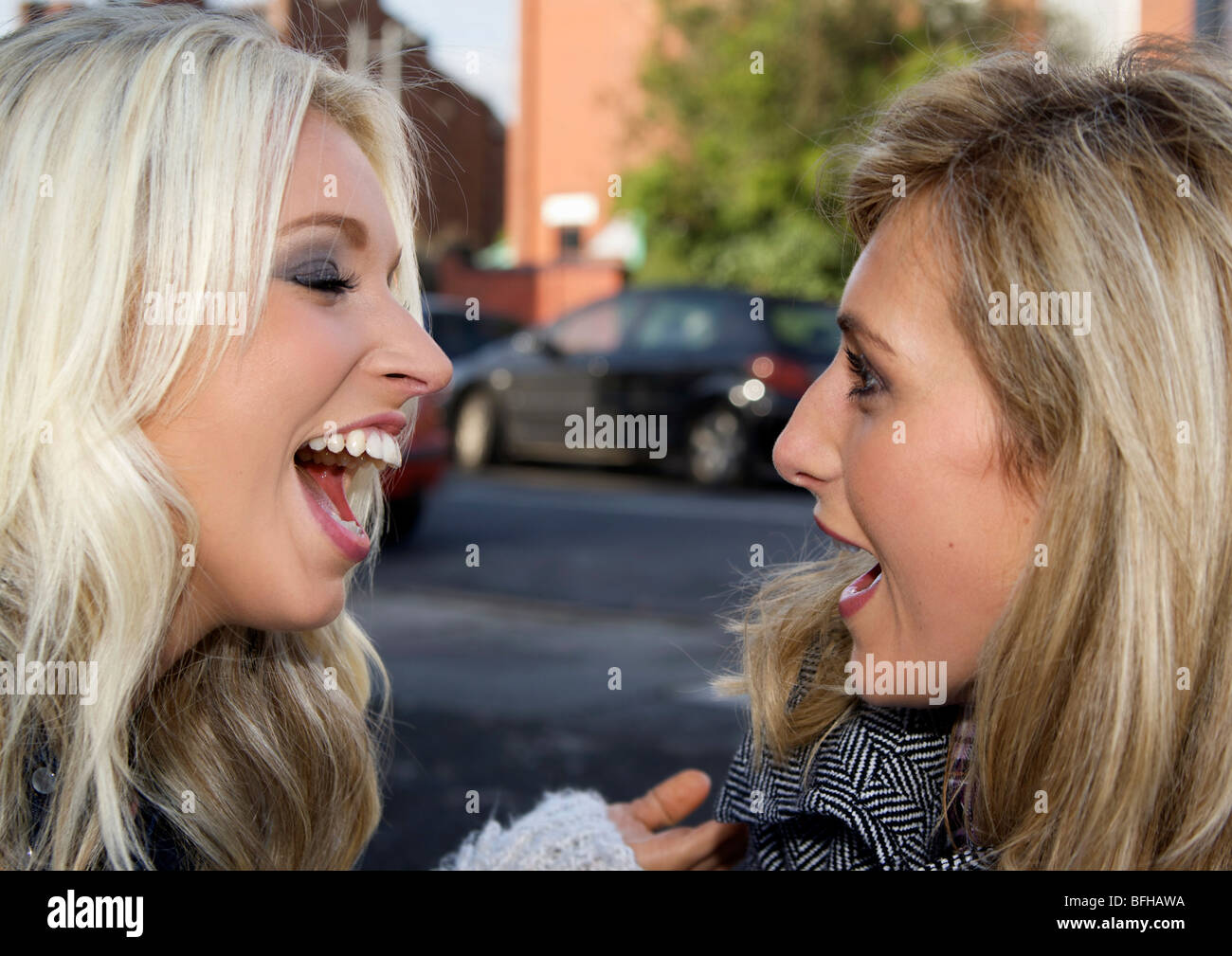 Woman laughing teeth mouth wide open hi-res stock photography and ...