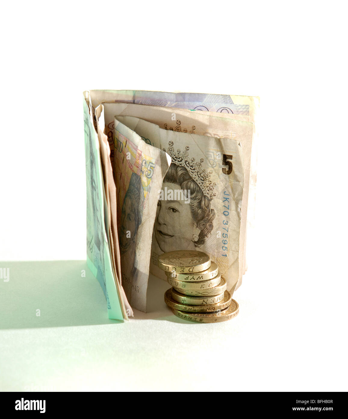 generic money image showing British coin and notes £ pound sterling ...