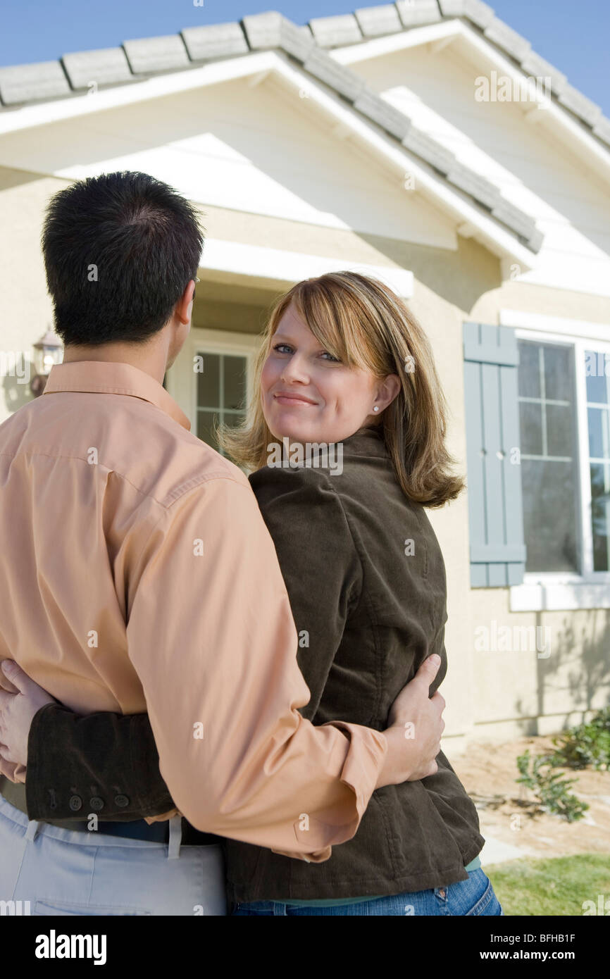 Couple admiring new house Stock Photo - Alamy Couple admiring new house Stock Photo - Alamy
