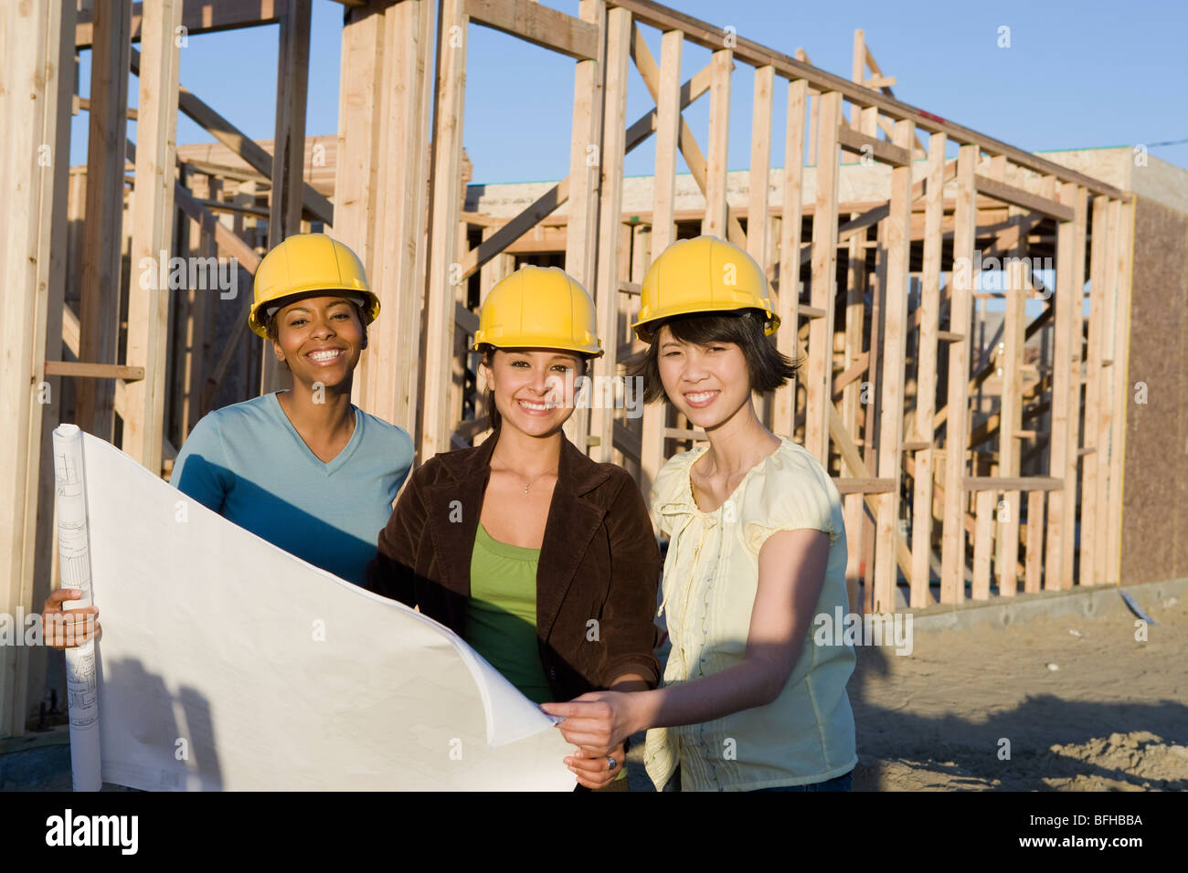 Young women in construction site Stock Photo - Alamy
