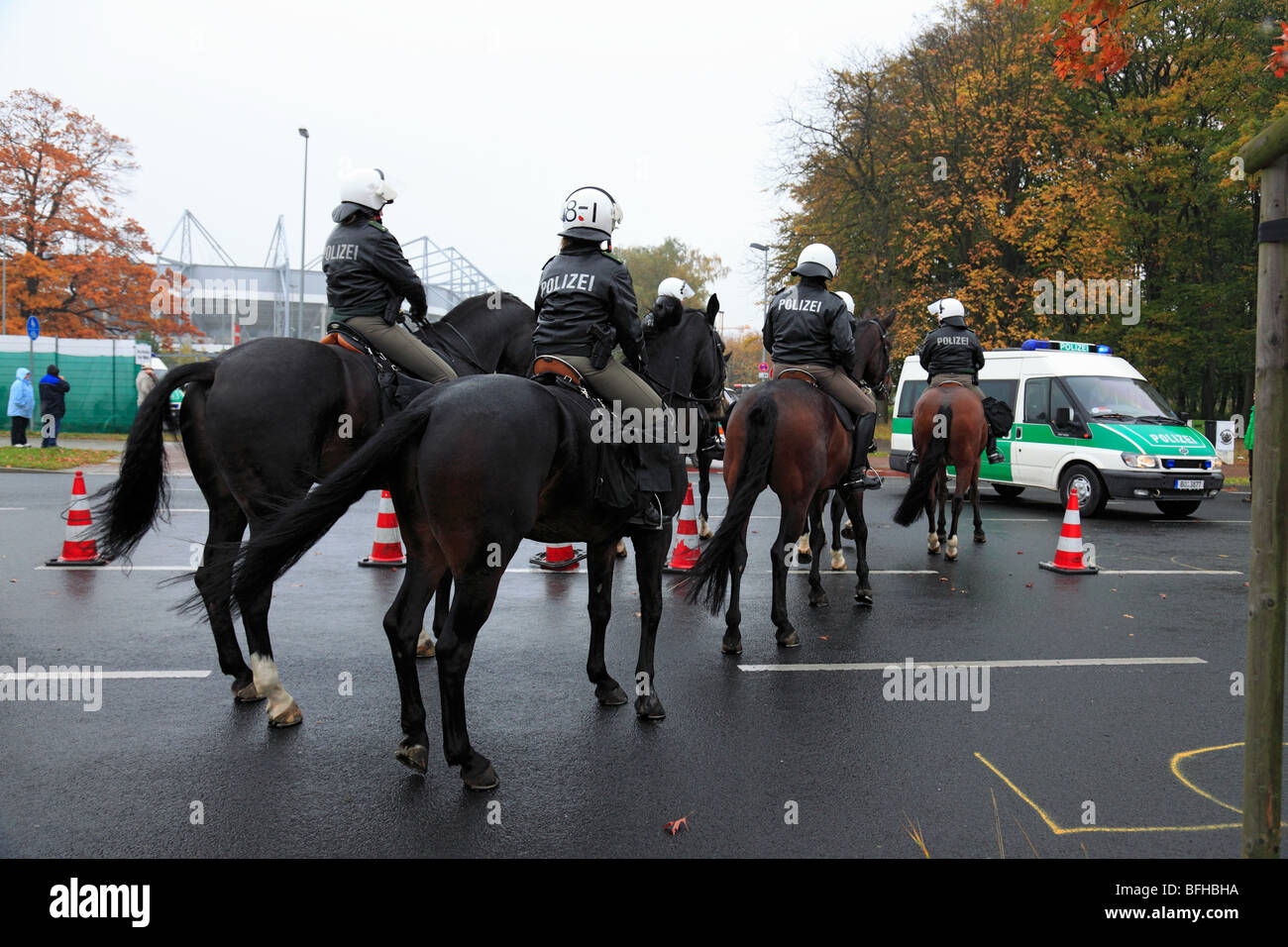 police operation at a football match, riding squad, police car, D ...