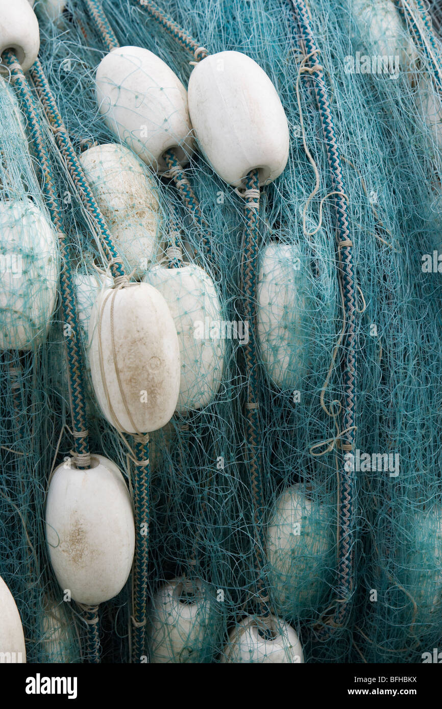 Rolled up fishing net, close up Stock Photo - Alamy