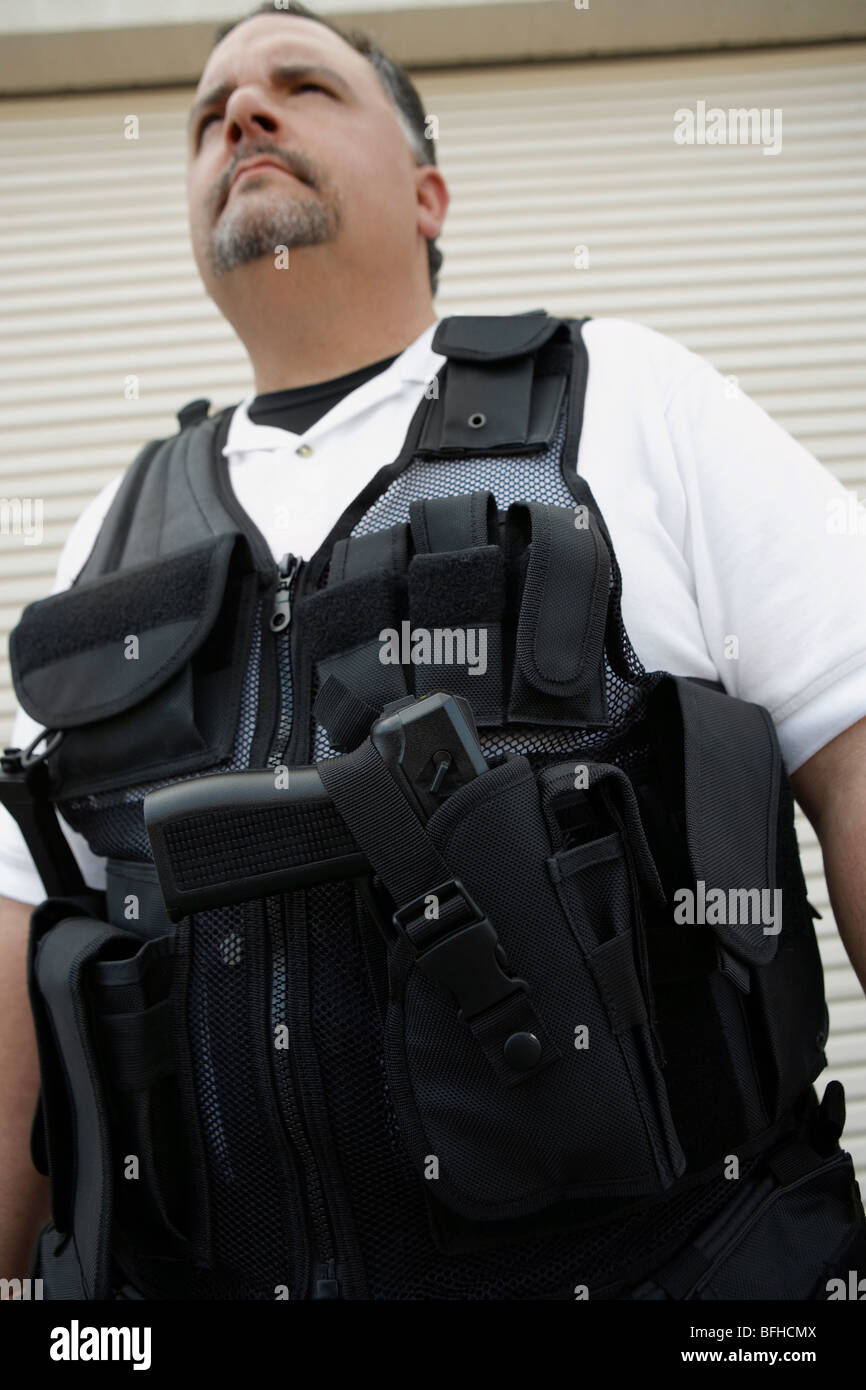 Portrait of security guard in bulletproof vest Stock Photo - Alamy