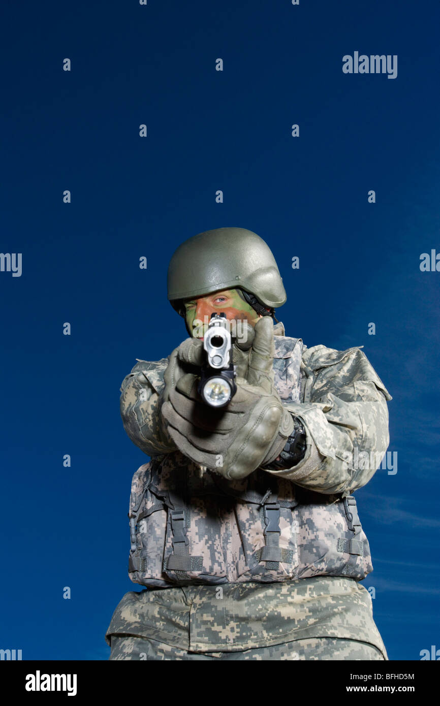 Man Aiming Gun Camera High Resolution Stock Photography and Images - Alamy