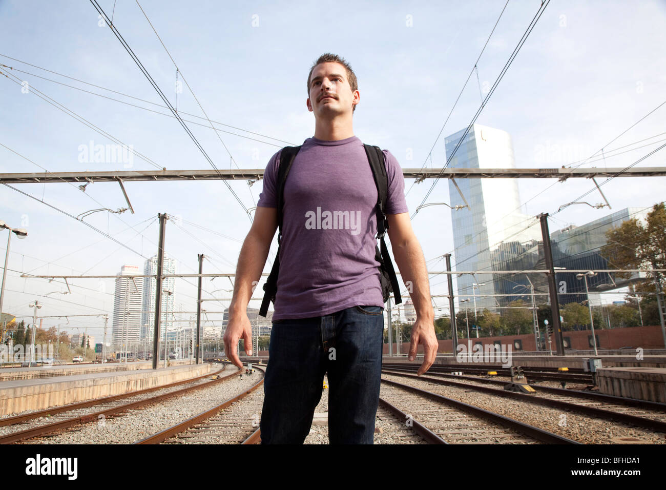 young man at the train station Stock Photo - Alamy