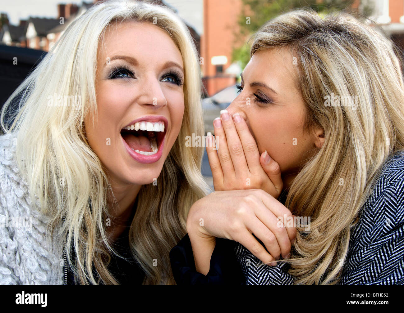 Woman laughing teeth mouth wide open hi-res stock photography and ...