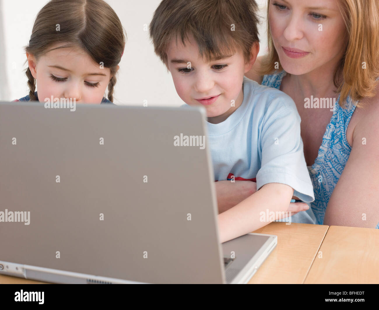 Children laptop parents hi-res stock photography and images - Alamy