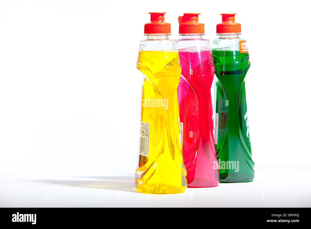 Three brightly coloured bottles of washing up liquid Stock Photo - Alamy