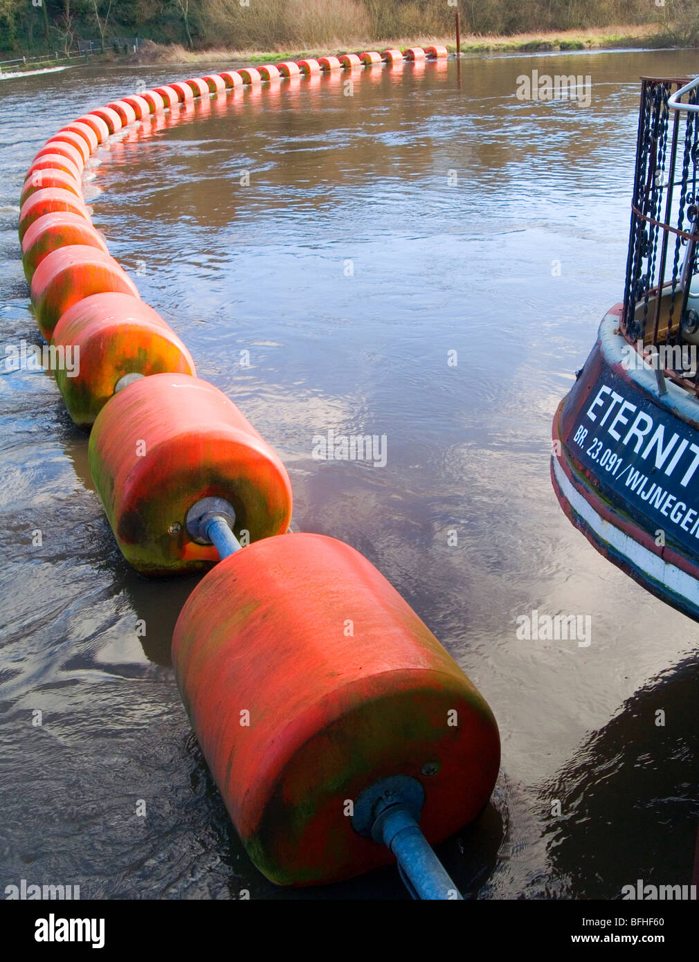 A line of bright orange floats on the River Trent at Stoke Bardolph in ...