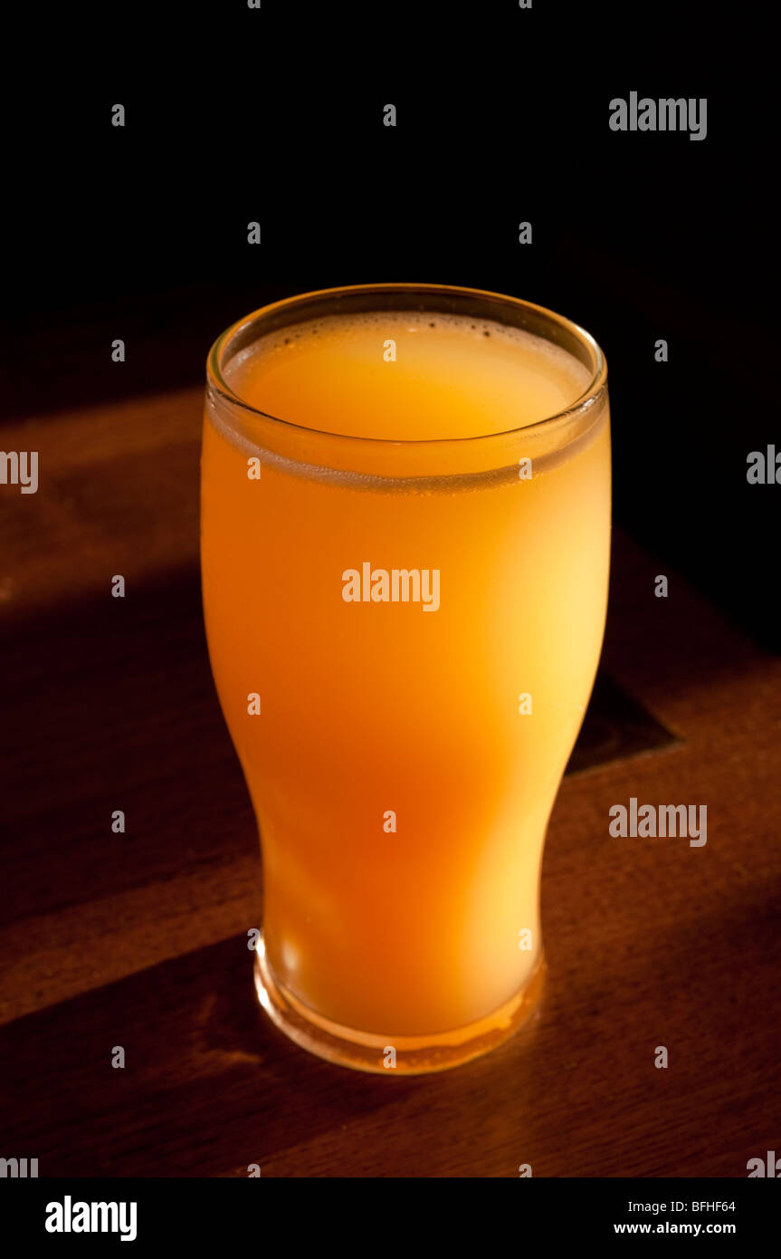 Pint glass of orange juice hi-res stock photography and images - Alamy
