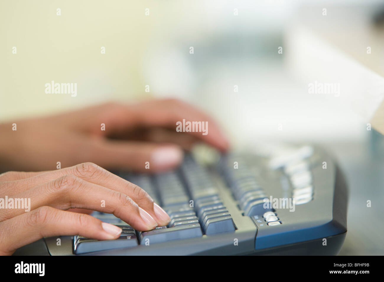 Close-up view of women's hands on computer keyboard Stock Photo - Alamy