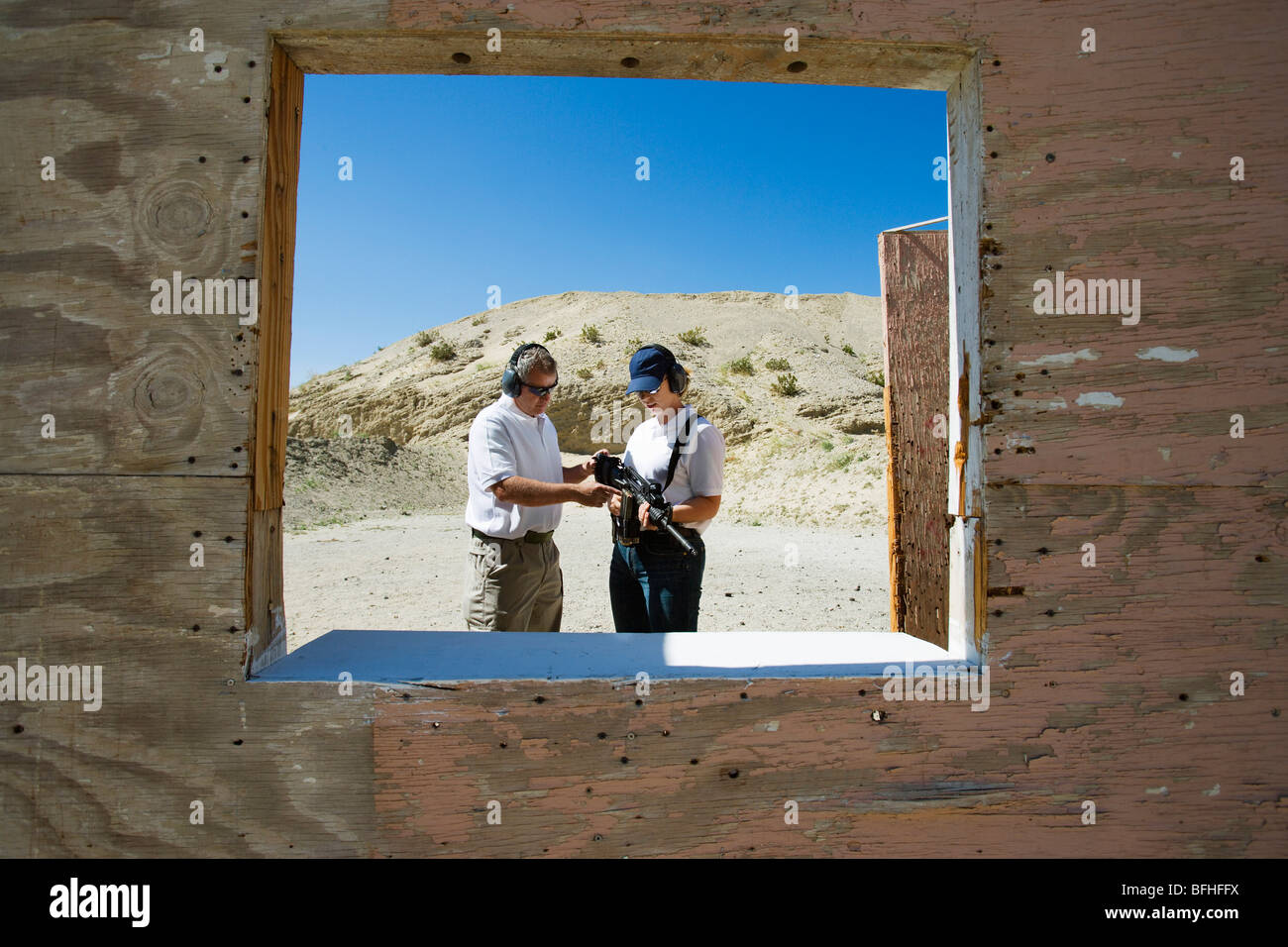 Woman loading gun hi-res stock photography and images - Alamy