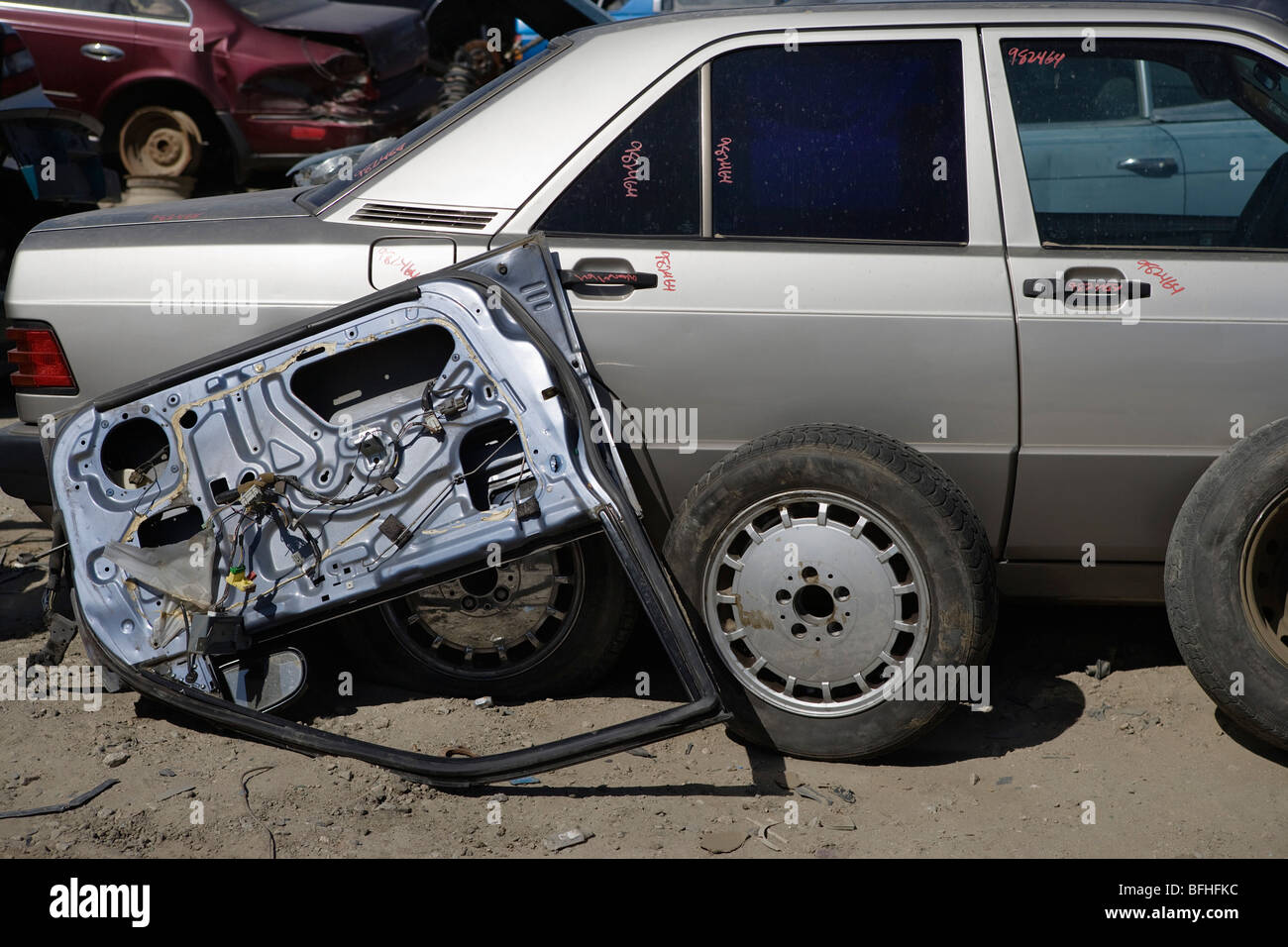 Damaged car and parts Stock Photo - Alamy