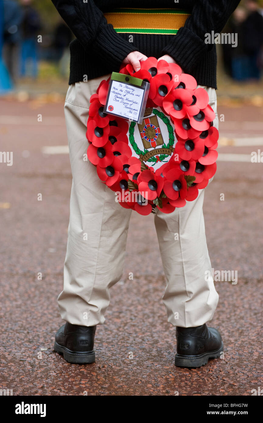 Poppy wreath being held by a person in the Remembrance Day Parade in ...