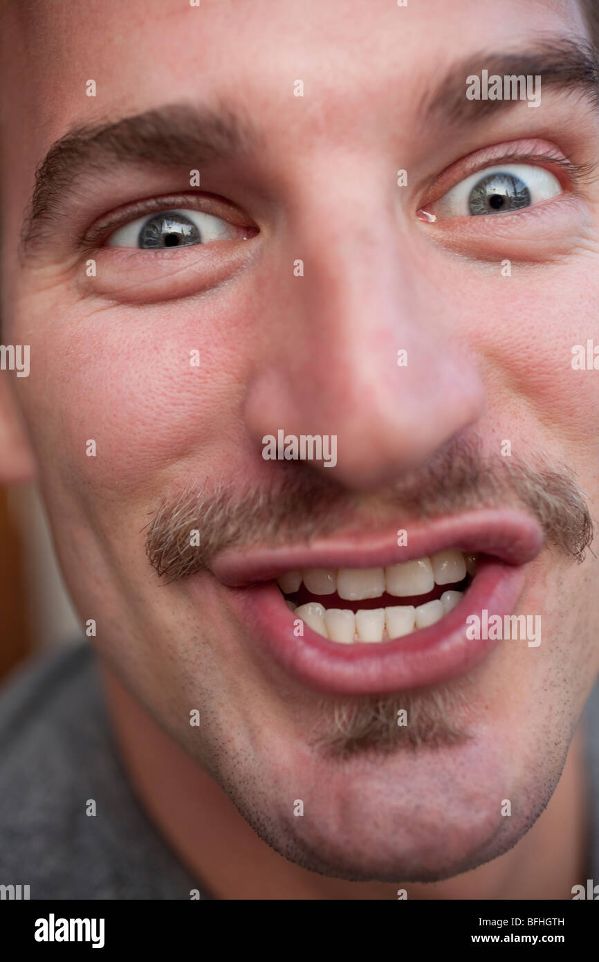 Close up on a funny male face Stock Photo - Alamy