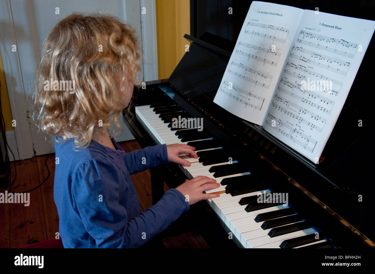 piano child playing Stock Photo - Alamy