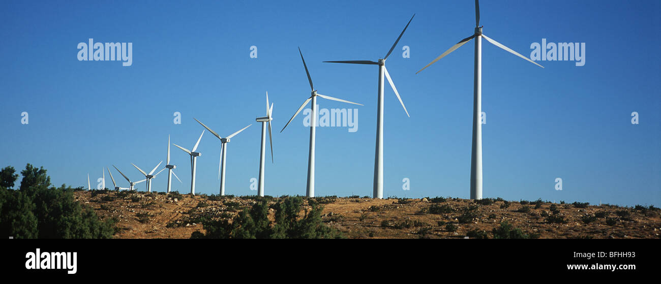 Row of wind turbines in desert Stock Photo - Alamy