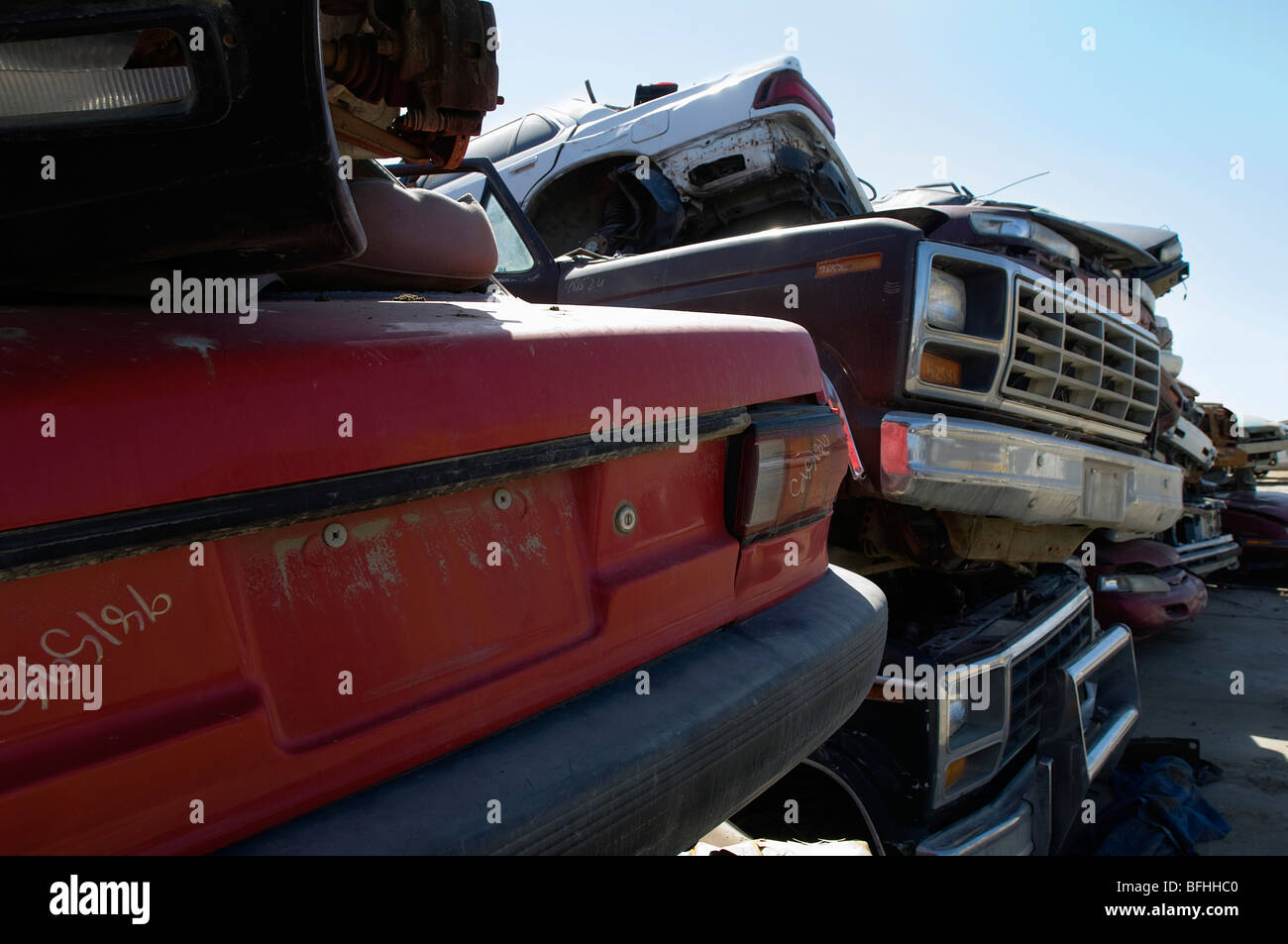 Stacked cars in junkyard Stock Photo - Alamy