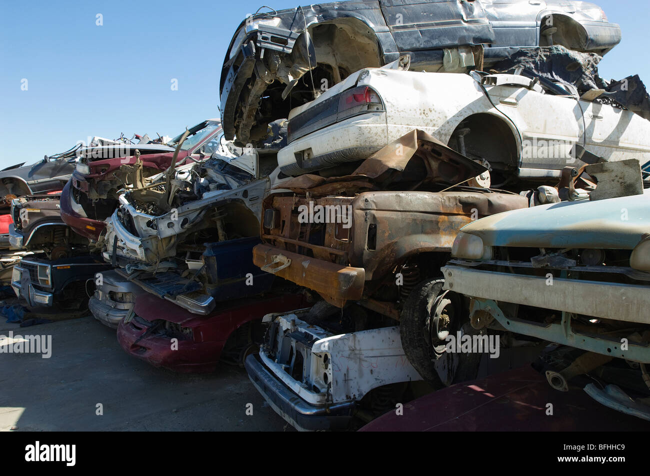 Stacked cars in junkyard Stock Photo - Alamy
