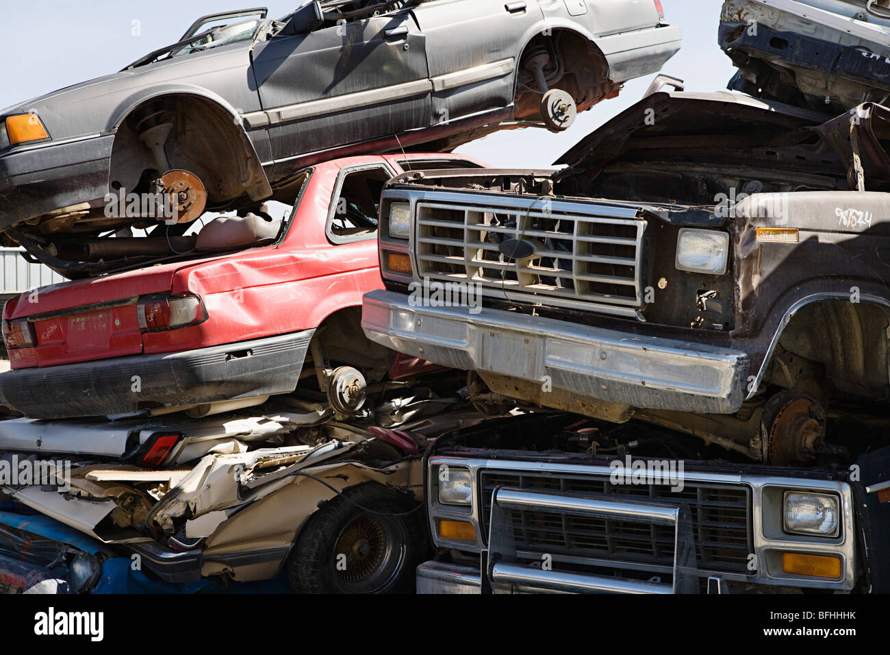 Stacked cars in junkyard Stock Photo - Alamy