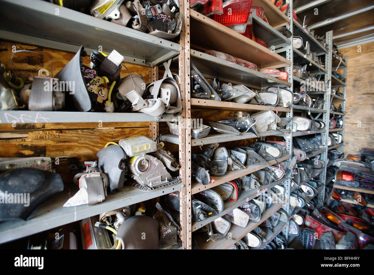 Old car parts in junkyard Stock Photo - Alamy