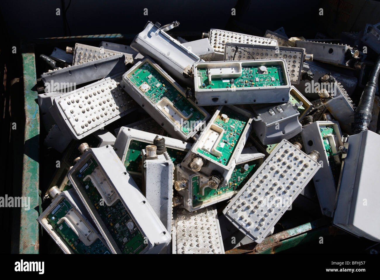 Pile of old electronic components in bin Stock Photo - Alamy