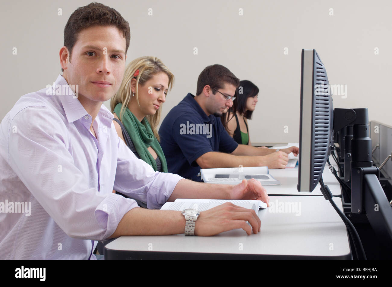 Students working in computer classroom Stock Photo - Alamy