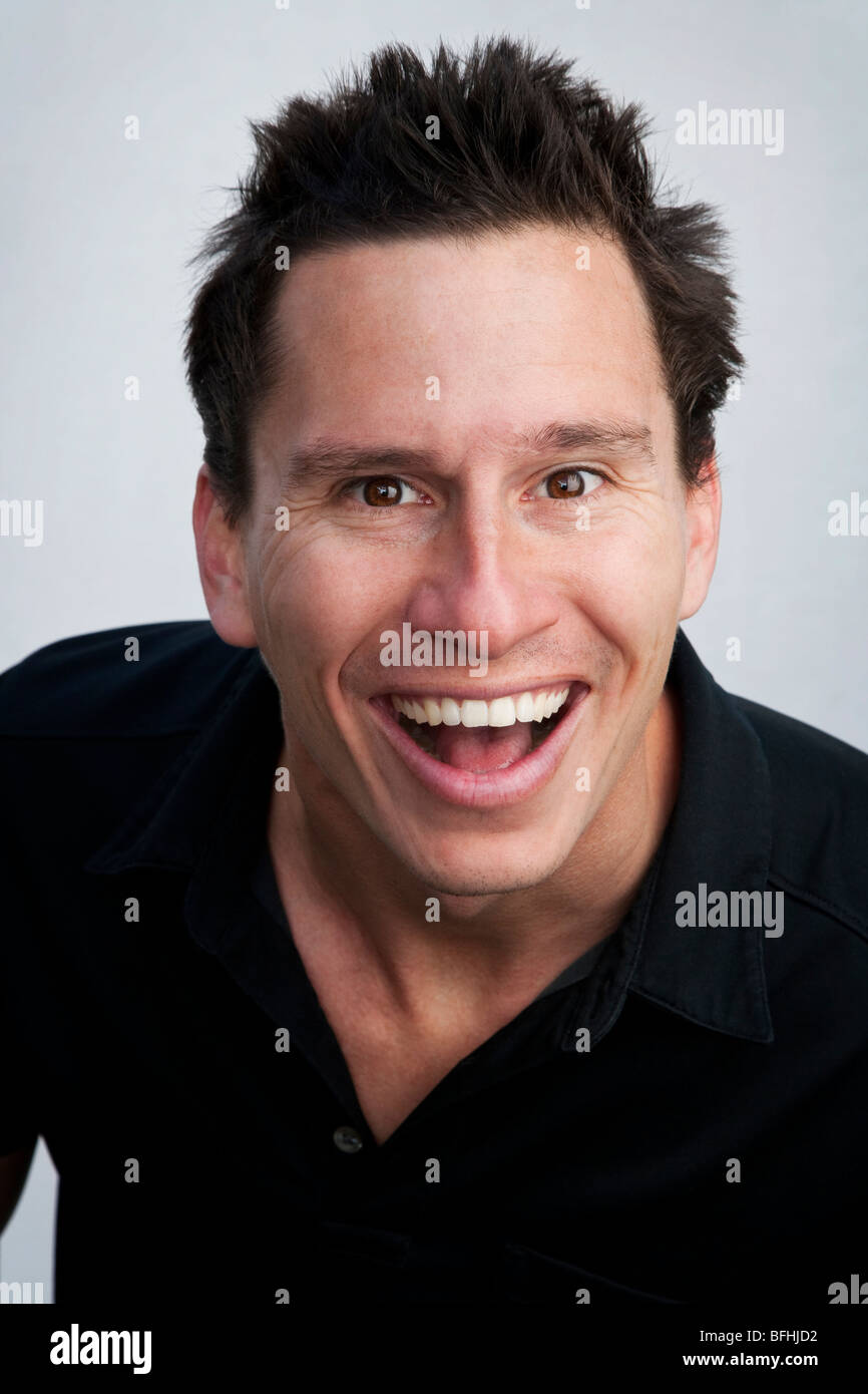 Expressive portrait of a young man Stock Photo - Alamy