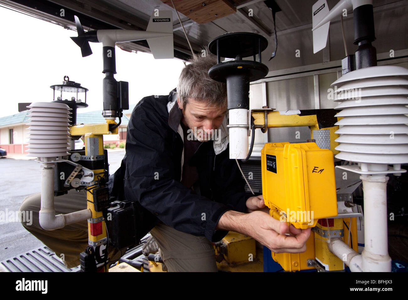 Brian Pollack (left) sets up a "tornado pod" in Witching, Kansas, USA ...