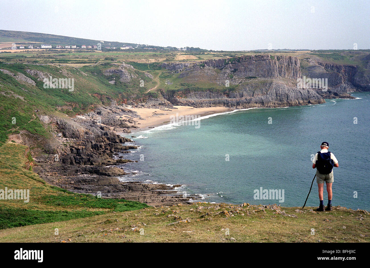 walker hiking mewslade bay cliffpath gower wales Stock Photo - Alamy
