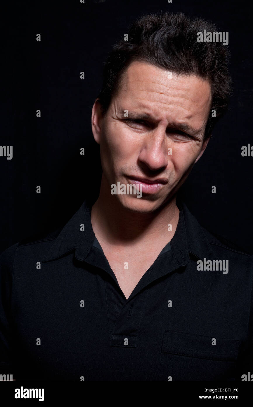 Expressive portrait of a young man Stock Photo - Alamy